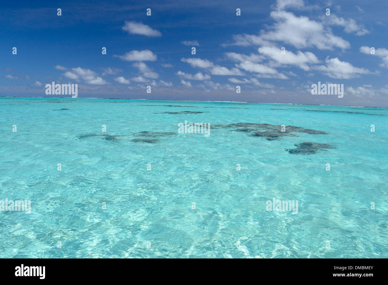 The colorful Aitutaki lagoon spotted by coral reef, in the middle of ...