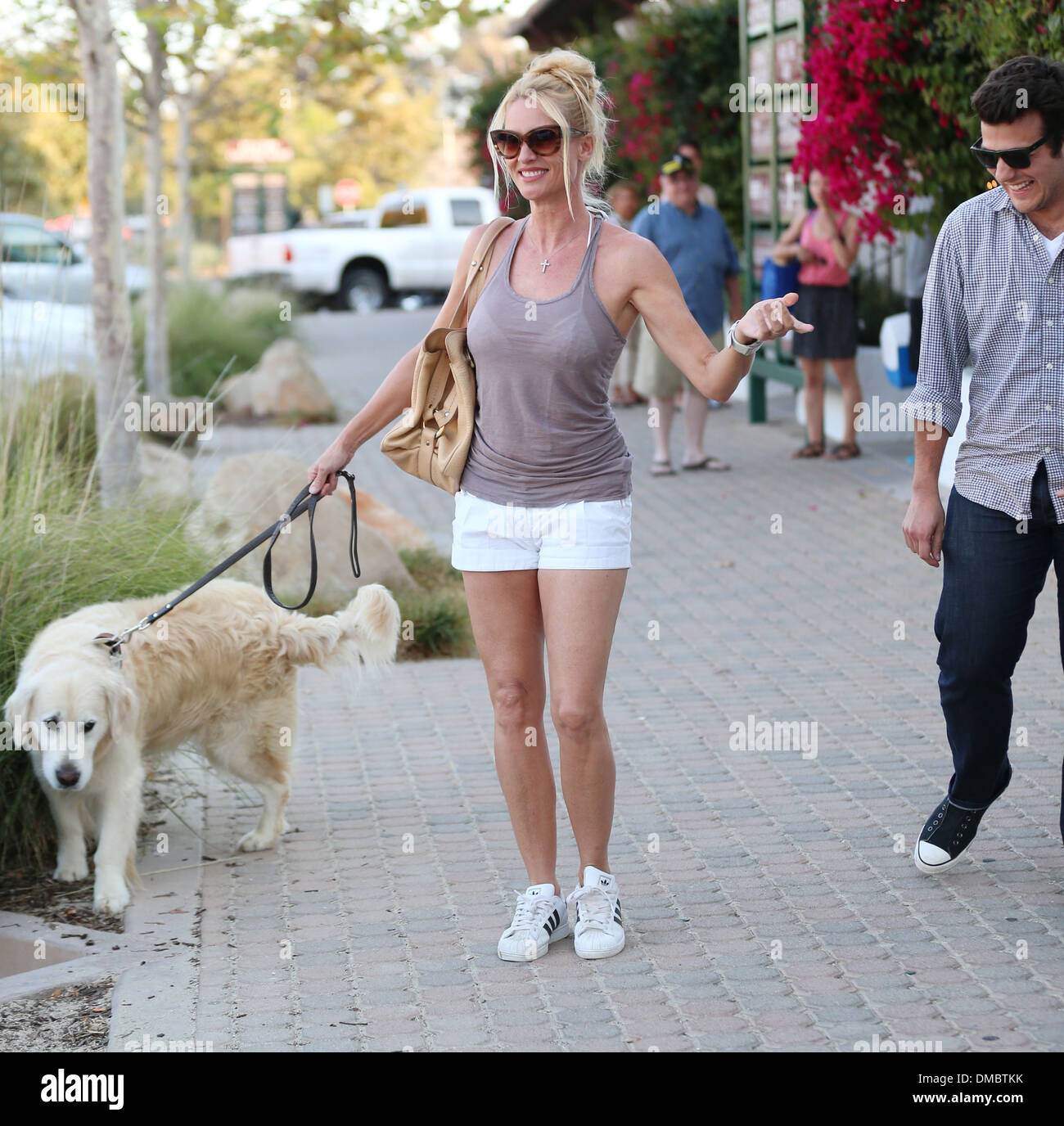 Nicollette Sheridan walking her Golden Retriever at Malibu Country Mart ...