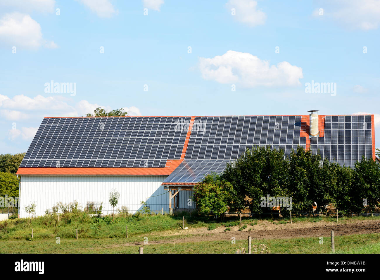 Barn of a farm with solar panels on the roof Stock Photo - Alamy