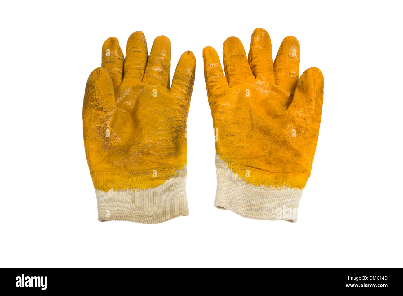 Used yellow working gloves isolated on white background Stock Photo - Alamy