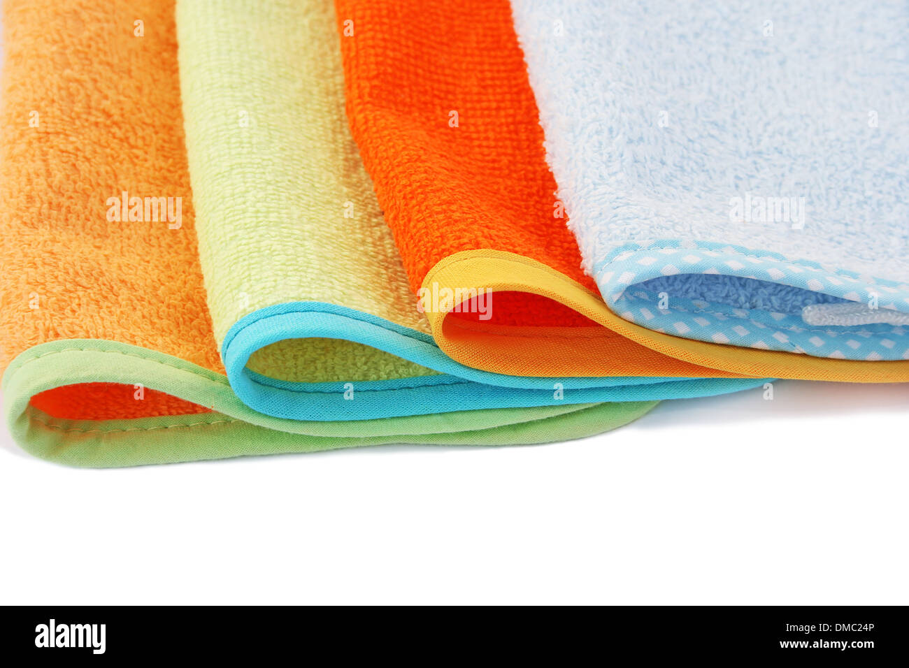 Colorful towels on white background Stock Photo - Alamy
