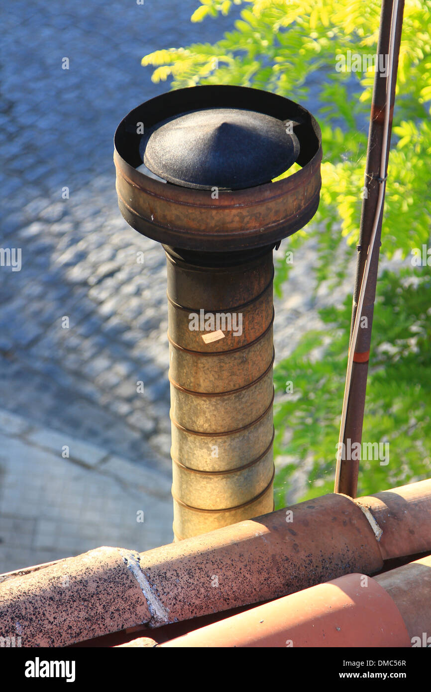 small metal chimney on a roof Stock Photo - Alamy