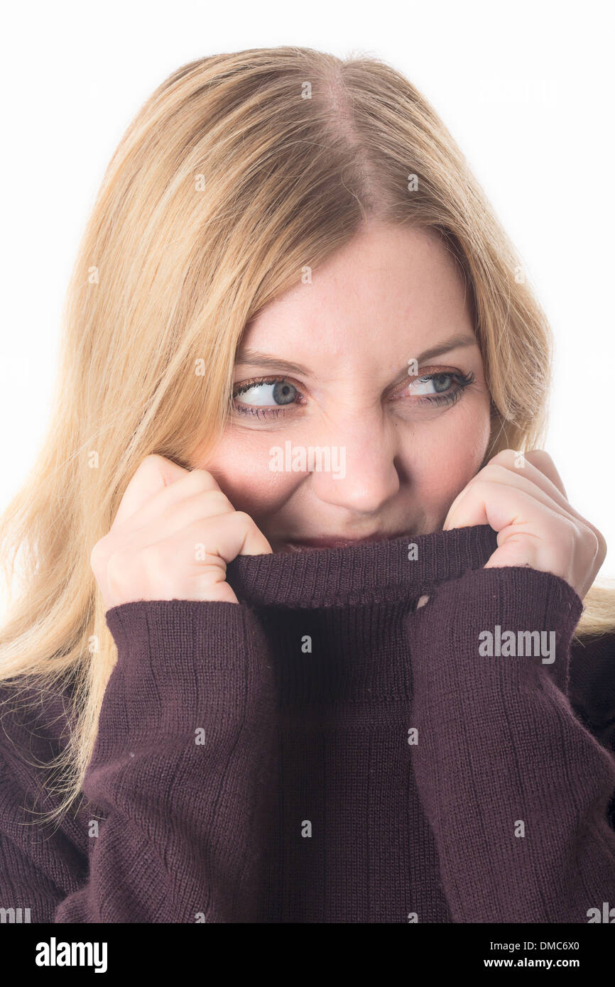 Putting on a jumper hi-res stock photography and images - Alamy
