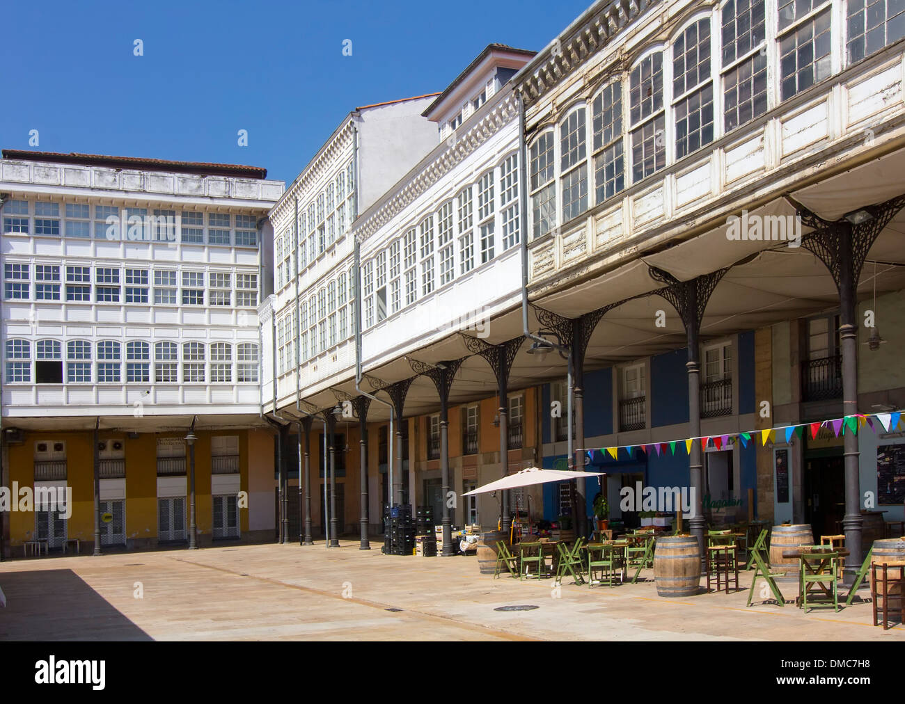 white wooden houses with large windows typical of the North of spain ...