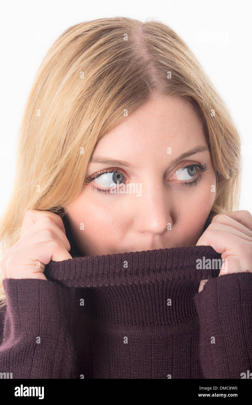 Putting on a jumper hi-res stock photography and images - Alamy