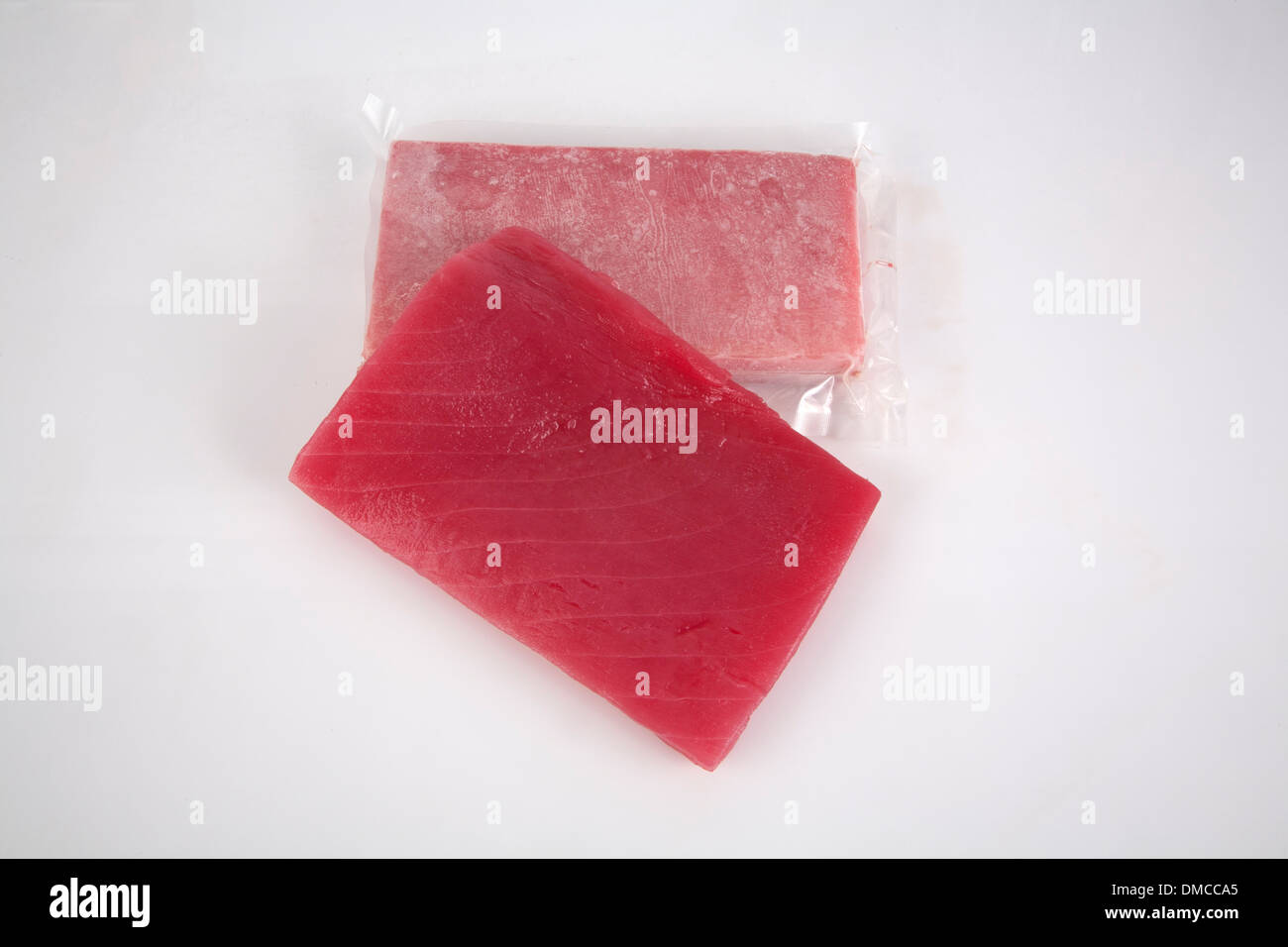 Frozen fish products laid on ice to be showcased for consumption ...