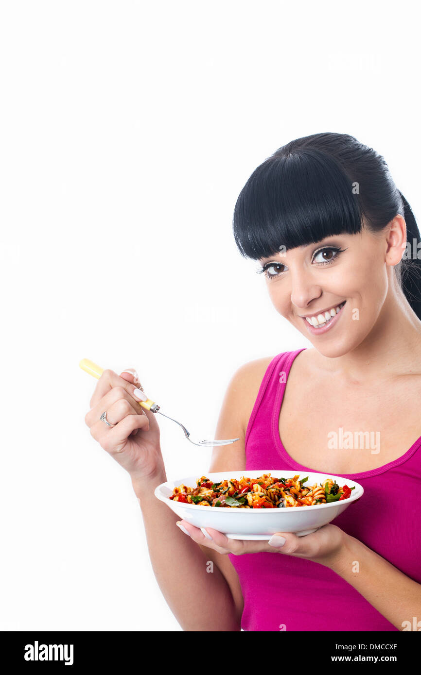 Young Woman Eating Pasta Salad Stock Photo - Alamy