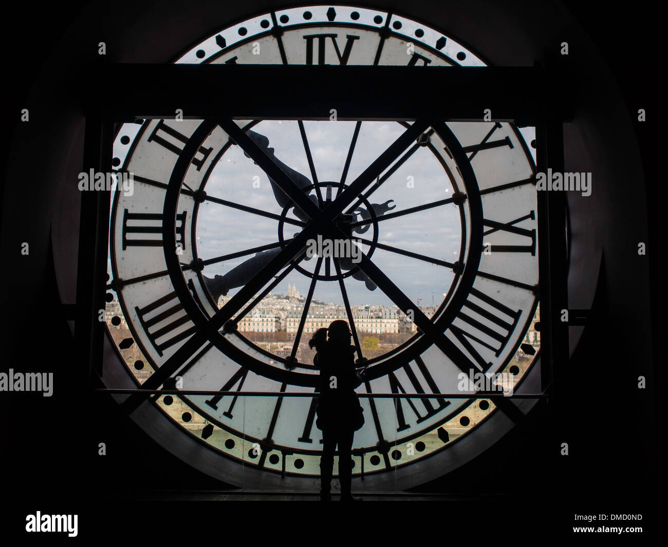 Behind the clock at Musée d'Orsay with Paris in background Stock Photo ...