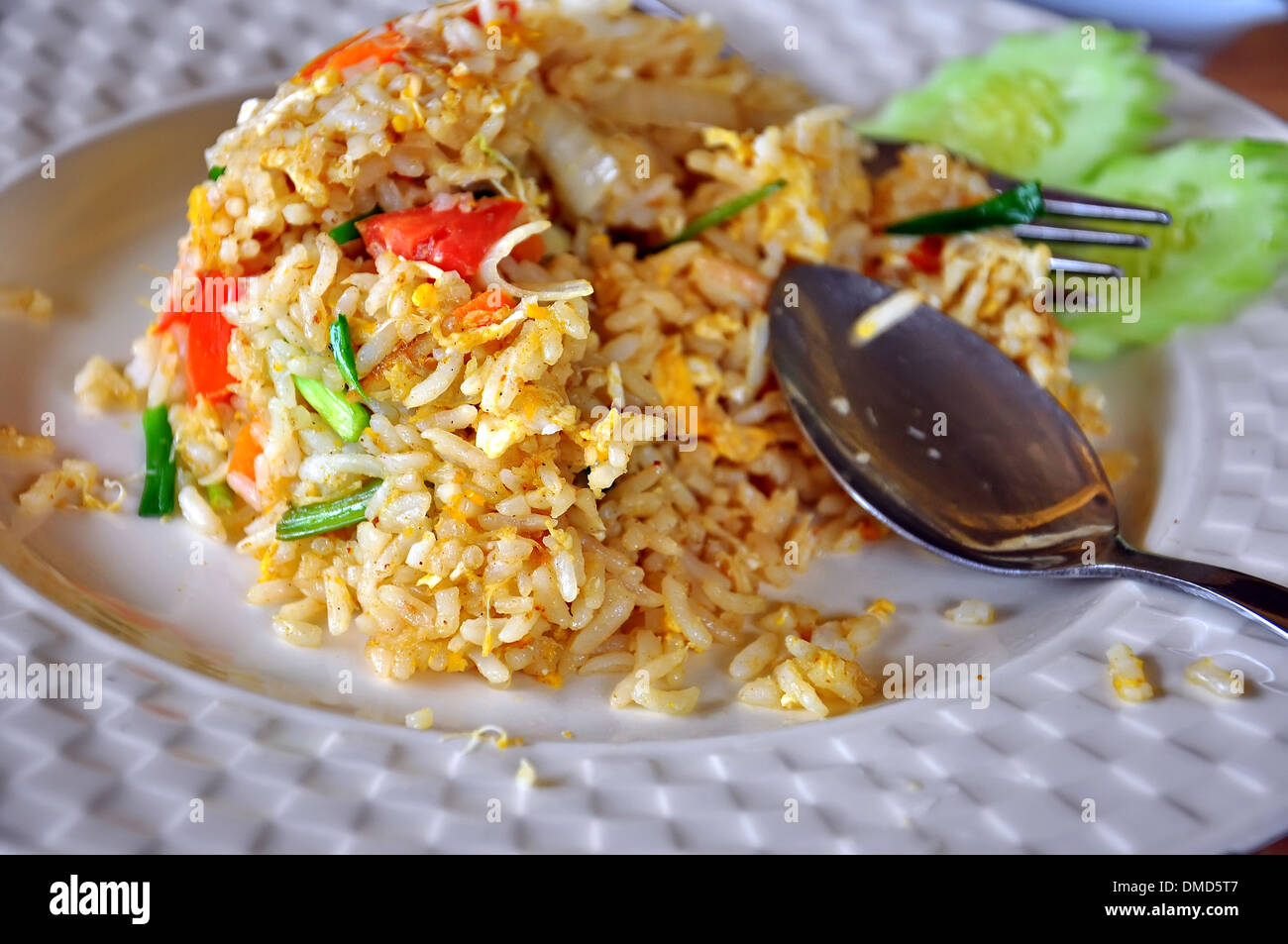 Fried rice with eggs and spoon and fork Stock Photo - Alamy