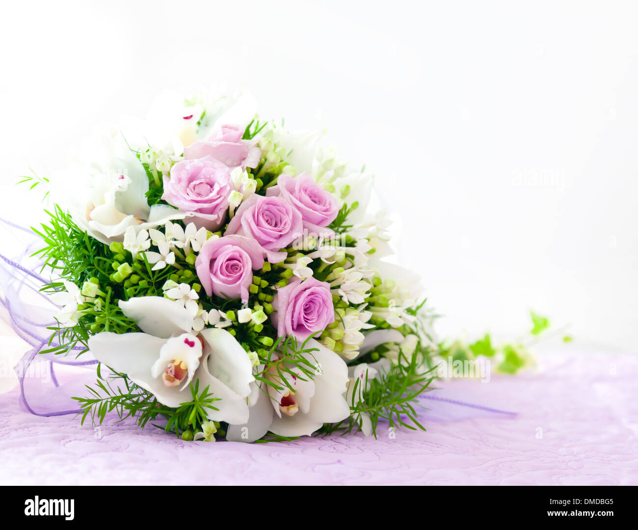 Wedding Pink Roses And White Orchid Bouquet Stock Photo - Alamy
