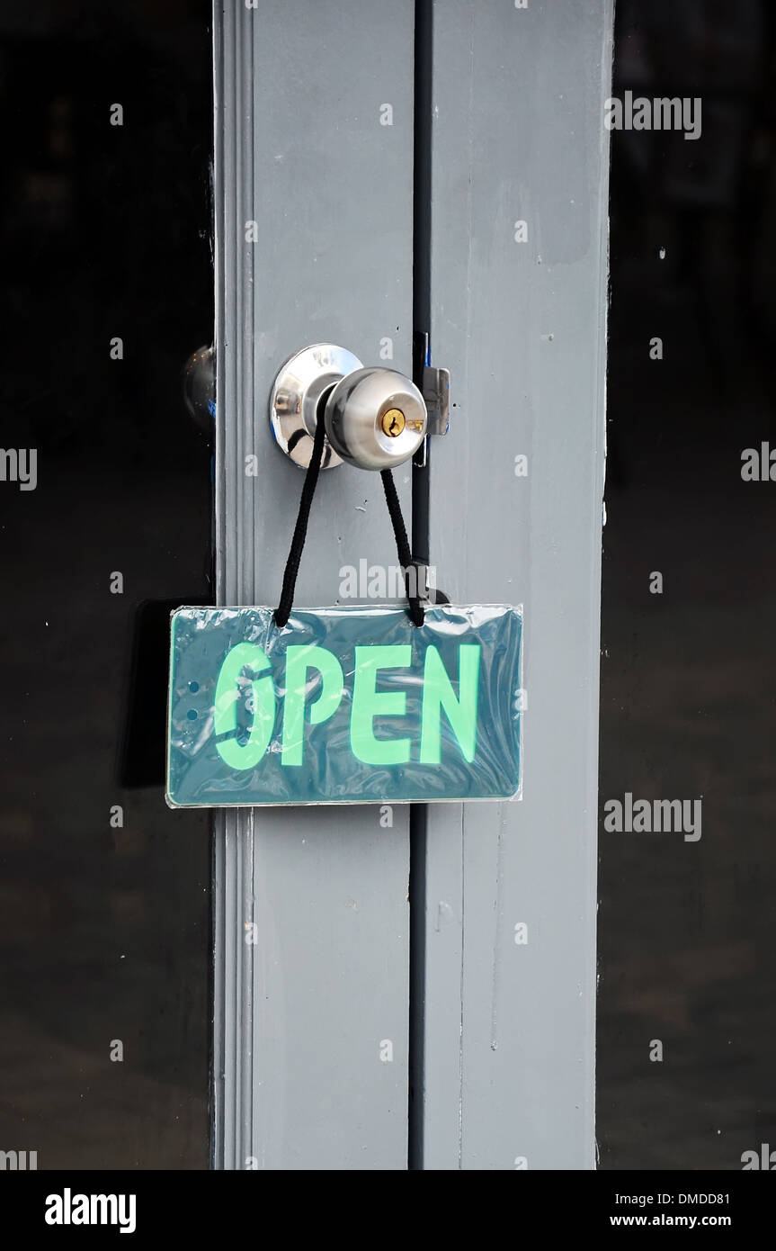 Open Label sign hanging on the door Stock Photo - Alamy