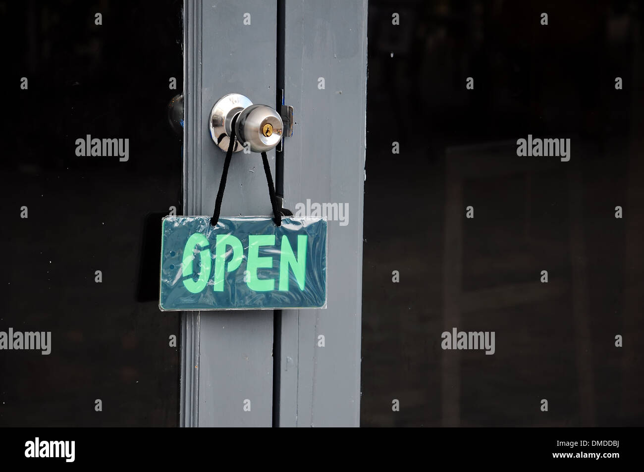 Open Label sign hanging on the door Stock Photo - Alamy