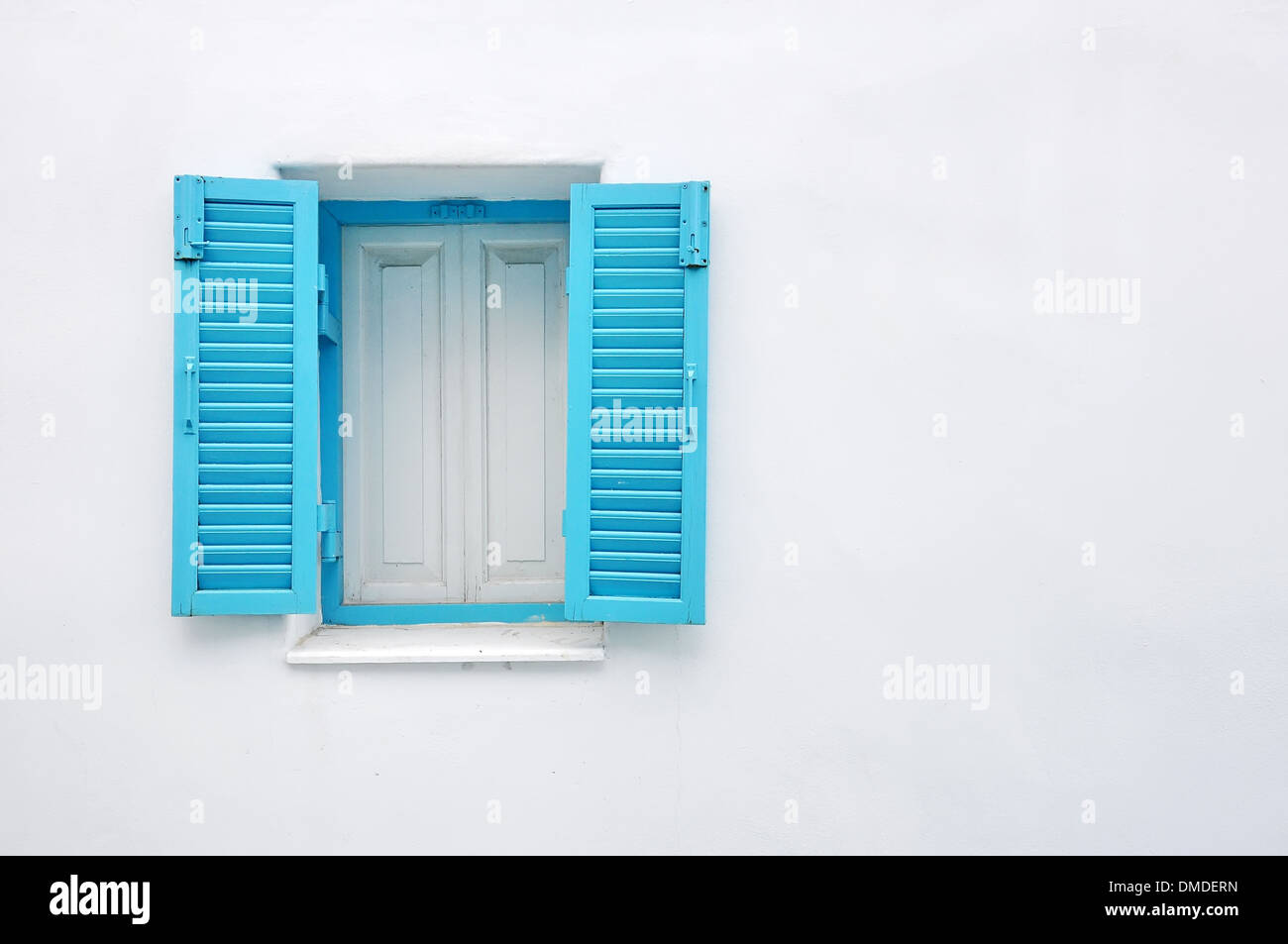 Blue window on white wall Stock Photo - Alamy
