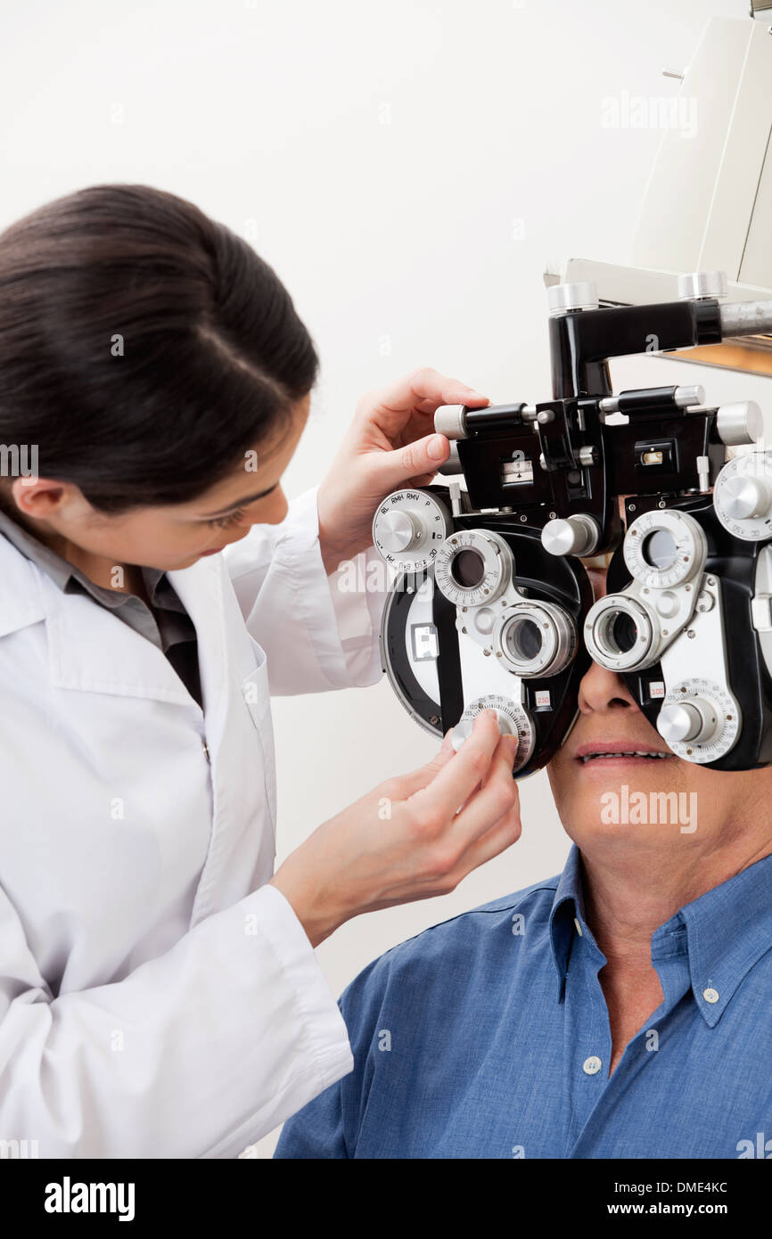 Eye Examination With Phoropter Stock Photo - Alamy