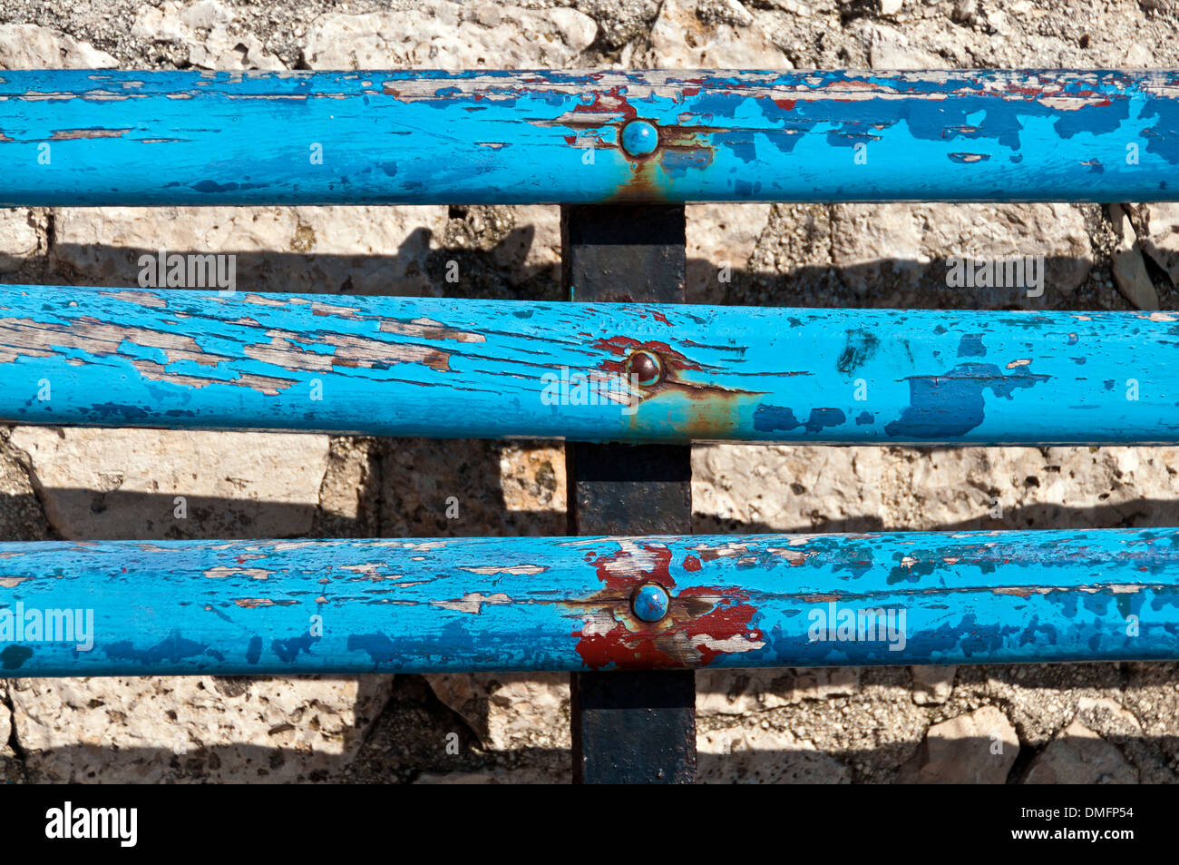 Paint peeling off the rails of a wooden bench Stock Photo - Alamy