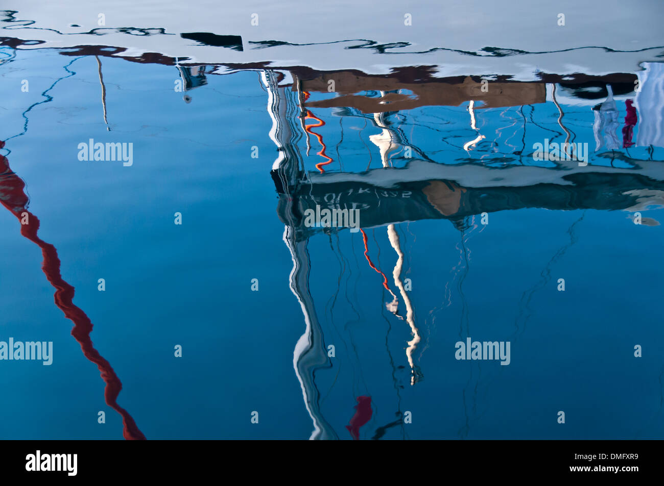 Reflections of a boat in water Stock Photo - Alamy