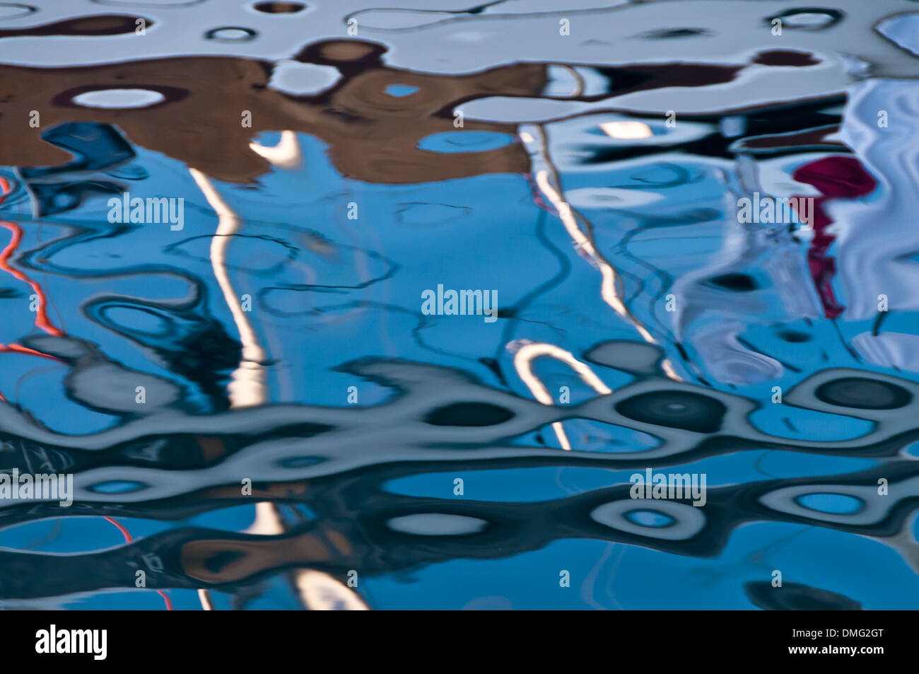 Reflections of a boat in water Stock Photo - Alamy