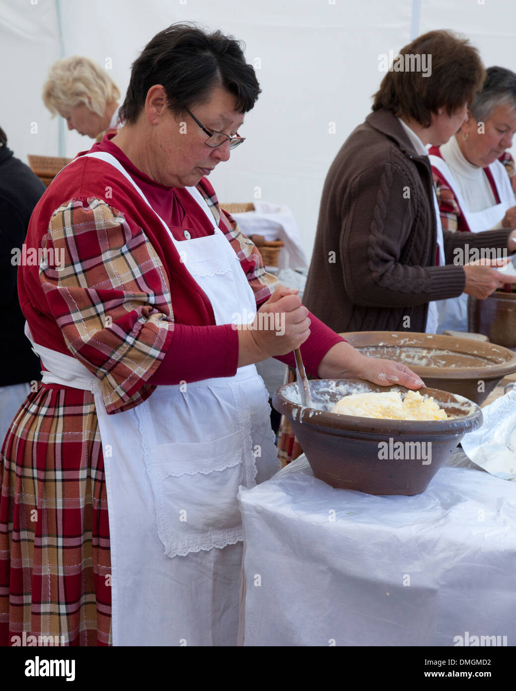 Woman making butter at Spreewaldfest in Luebben Stock Photo - Alamy