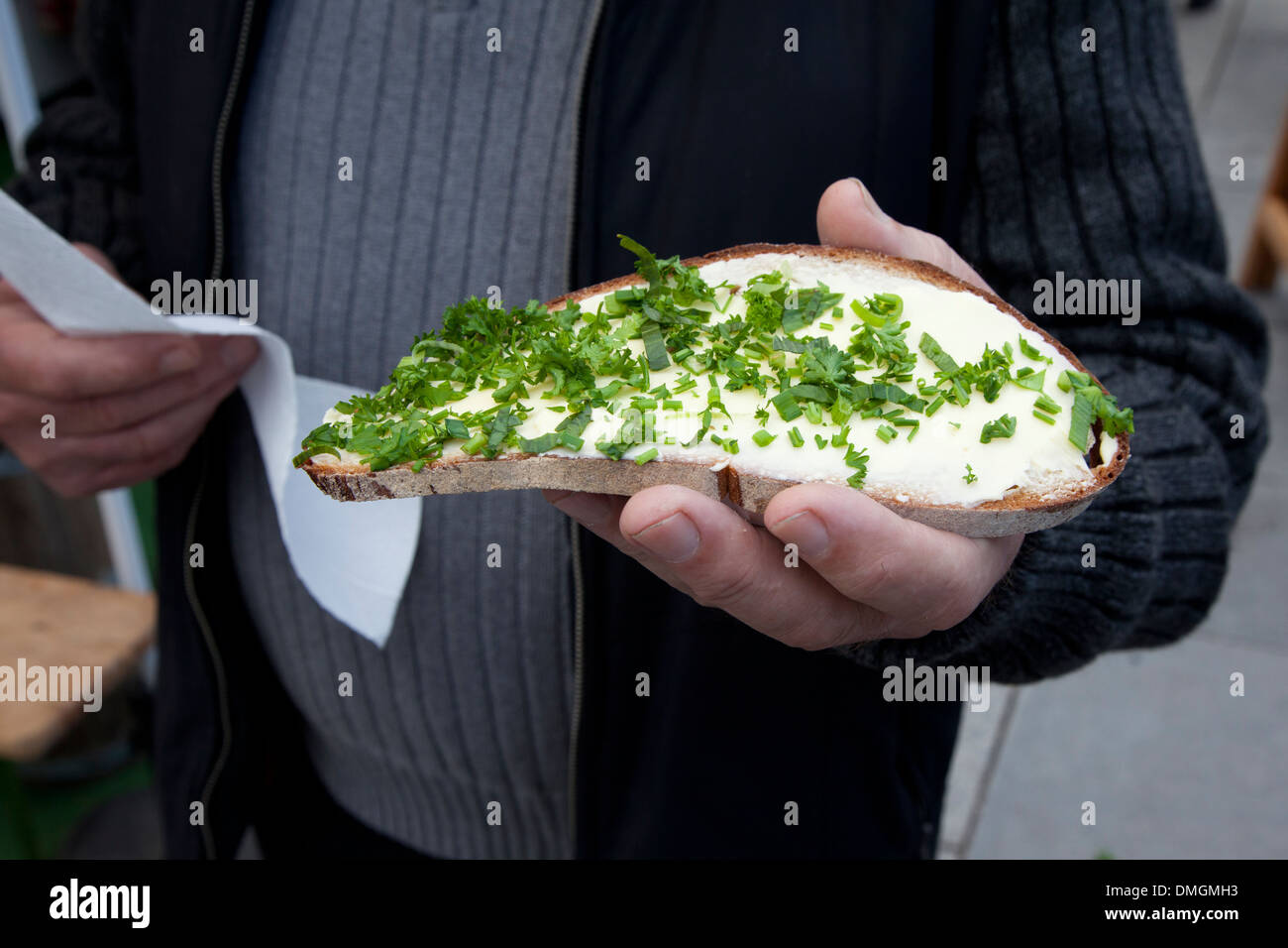 Man eating with bread hi-res stock photography and images - Alamy
