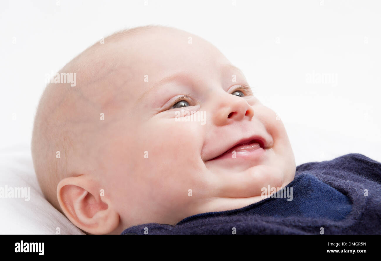 12 week old toddler smiling in horizontal image Stock Photo - Alamy