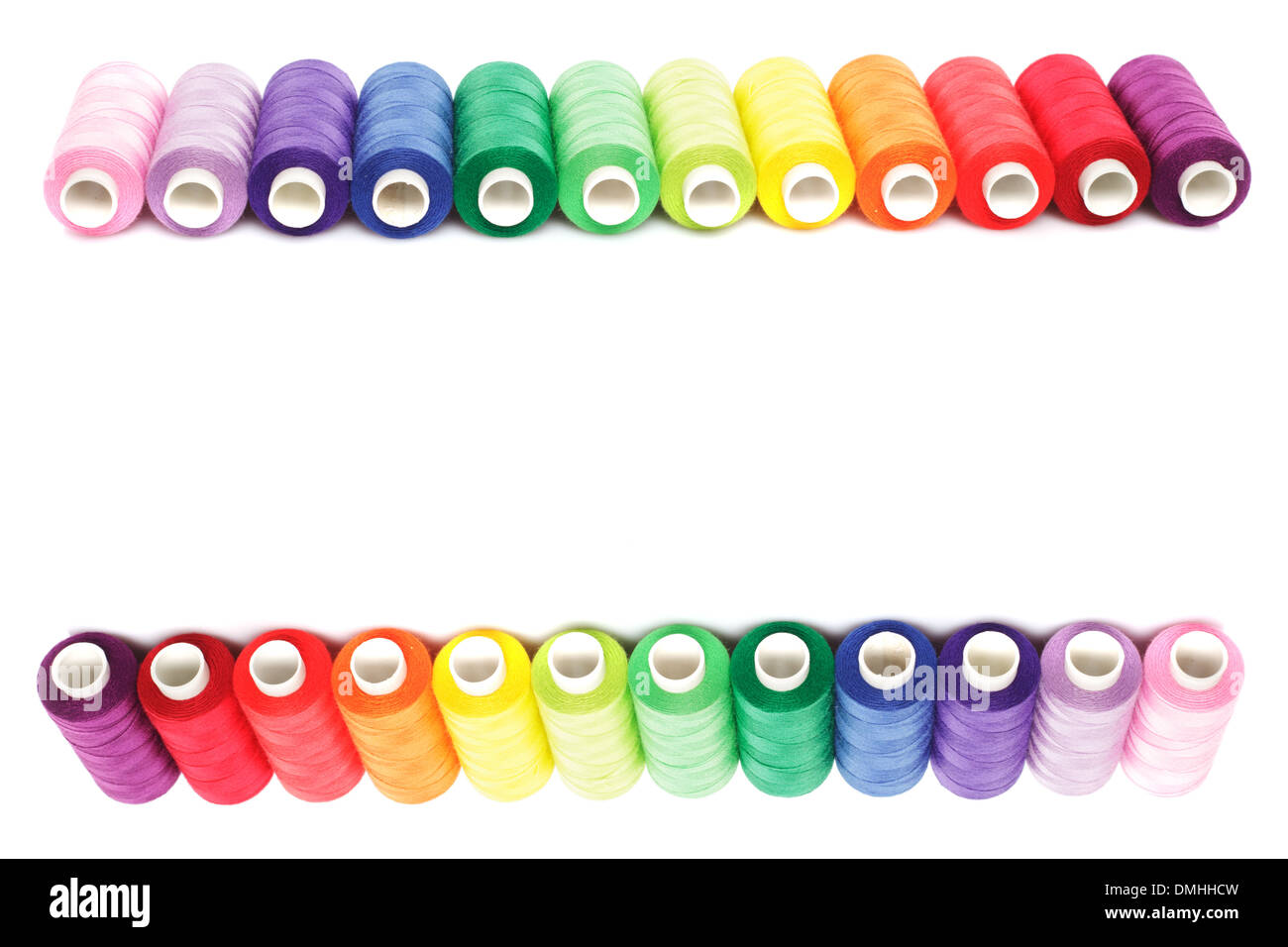 Sewing multicolored threads isolated on white Stock Photo - Alamy