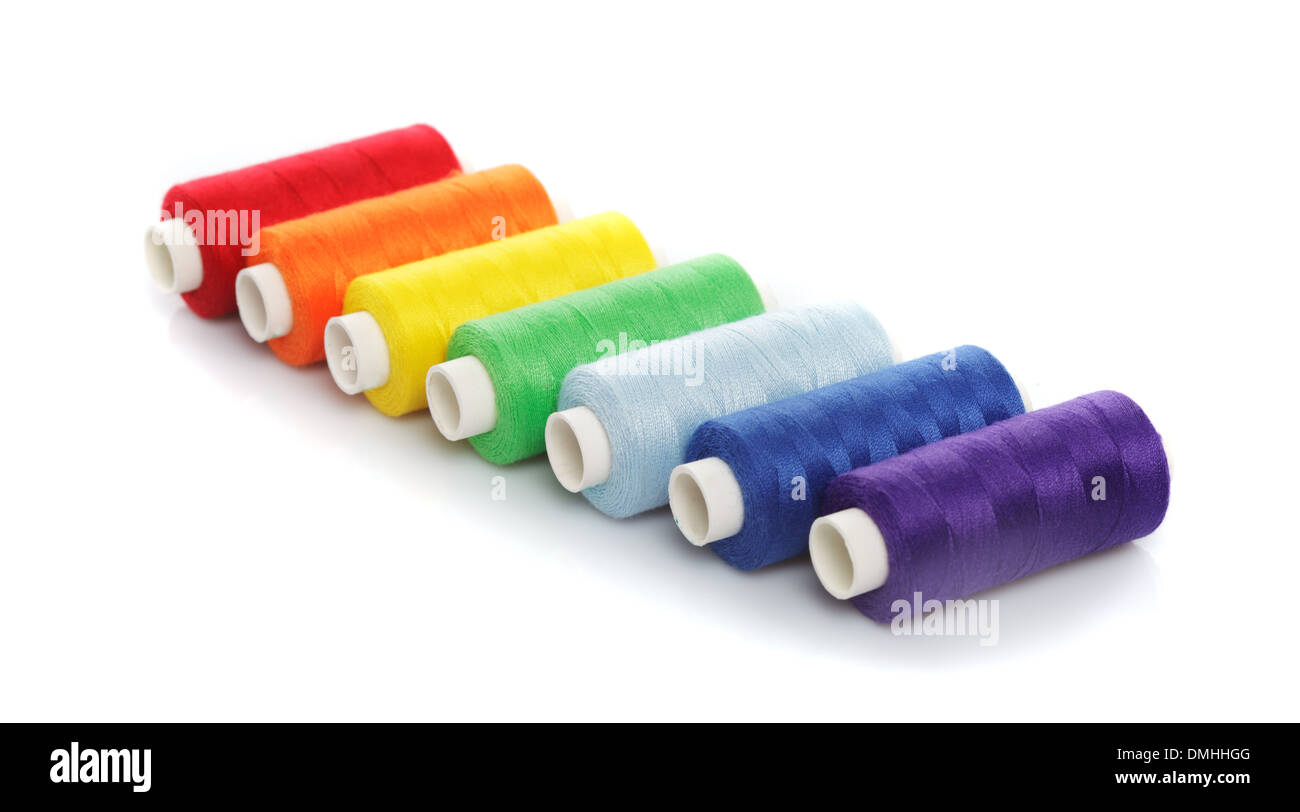 Sewing multicolored threads isolated on white Stock Photo - Alamy