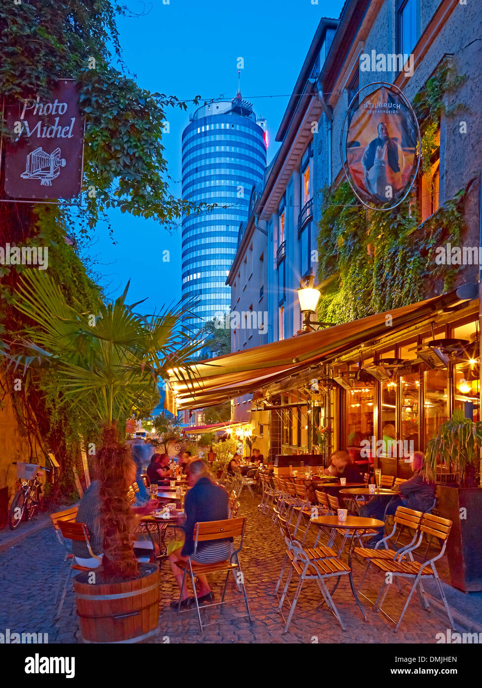 Pub scene in the Wagnergasse with Intershop Tower in Jena., Thuringia ...