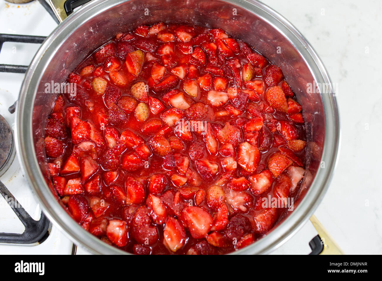 In the Polish kitchen. Preparing a delicious strawberry jam Stock Photo ...