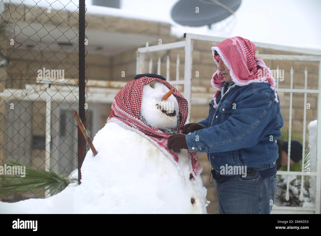 Ramallah, Palestinian Territory. 14th Dec, 2013. A Palestinian man ...