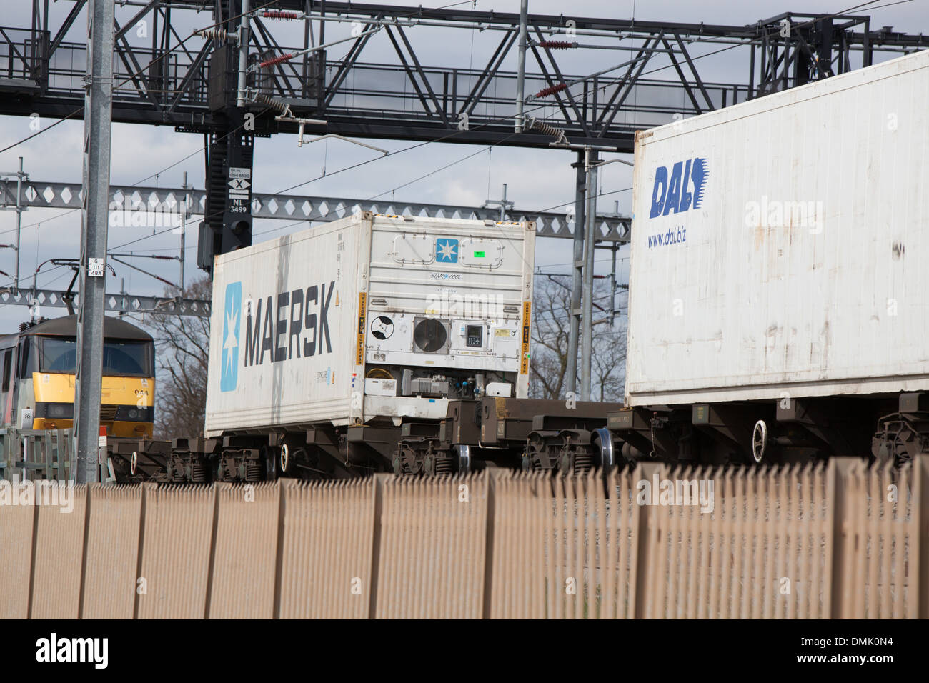 A freight train on the West Coast Main Line in the Midlands Stock Photo ...