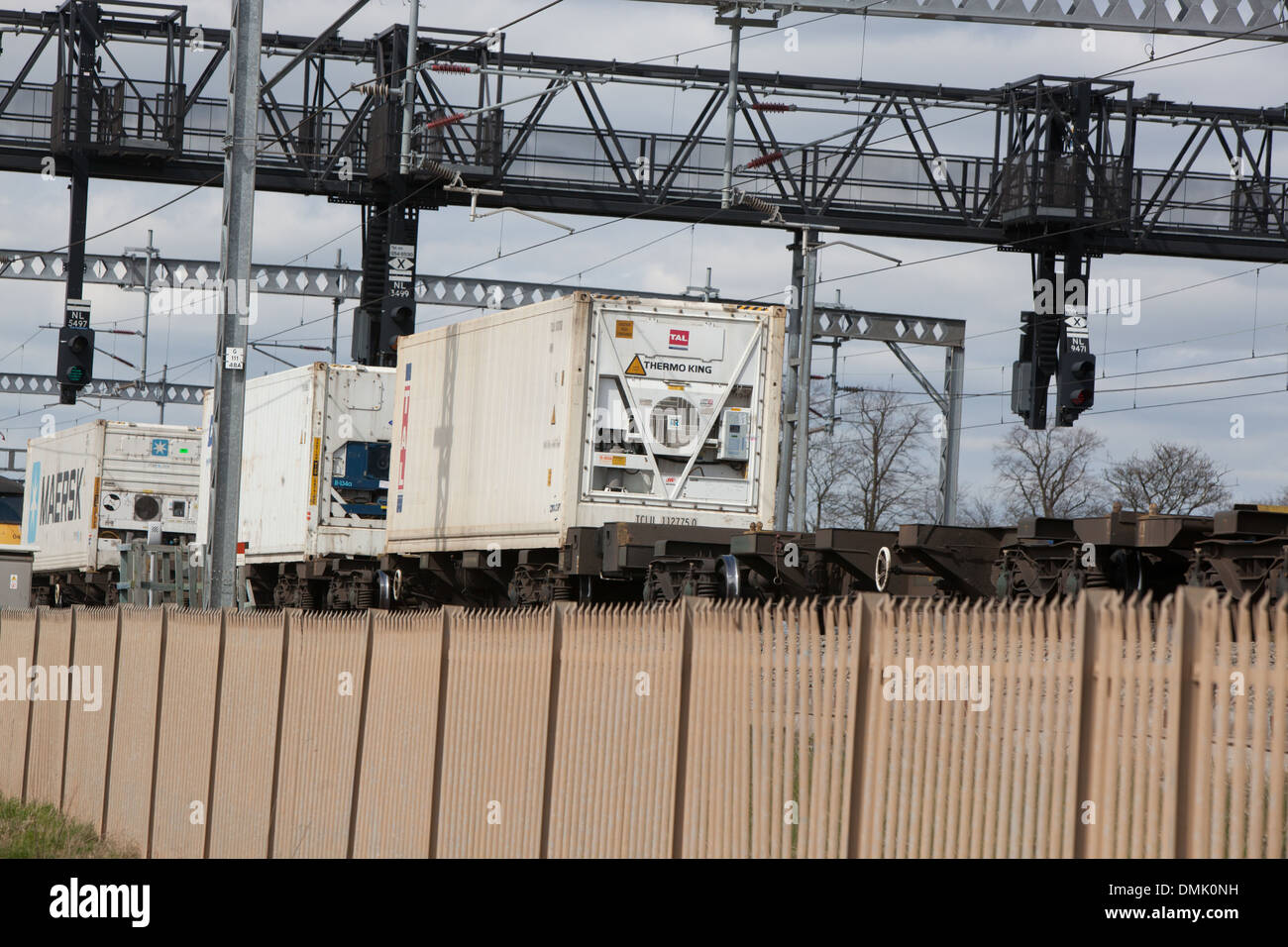 A freight train on the West Coast Main Line in the Midlands Stock Photo ...