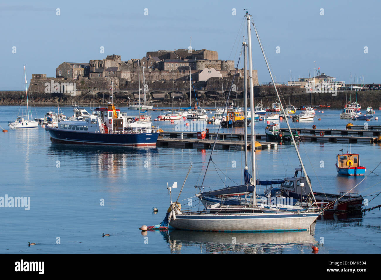 PORT OF SAINT PETER PORT WITH CASTLE CORNET IN THE BACKGROUND, GUERNSEY ...
