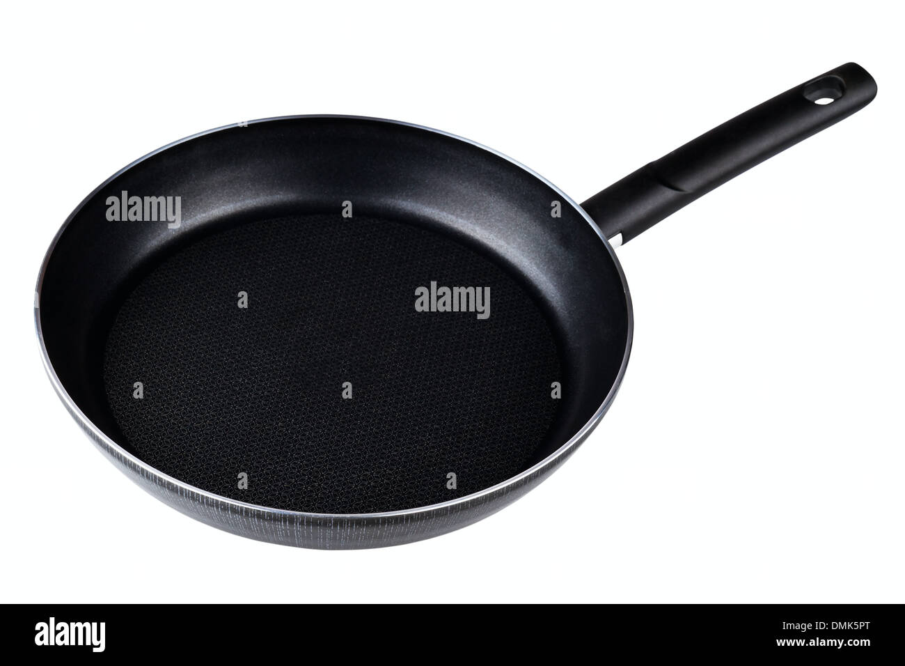 Frying pan with a teflon covering isolated on a white background Stock ...