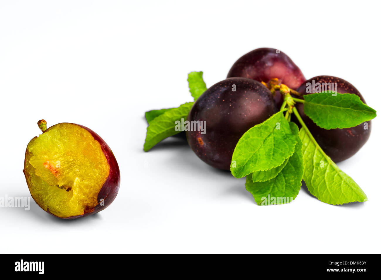ripe plum isolated on white background Stock Photo - Alamy