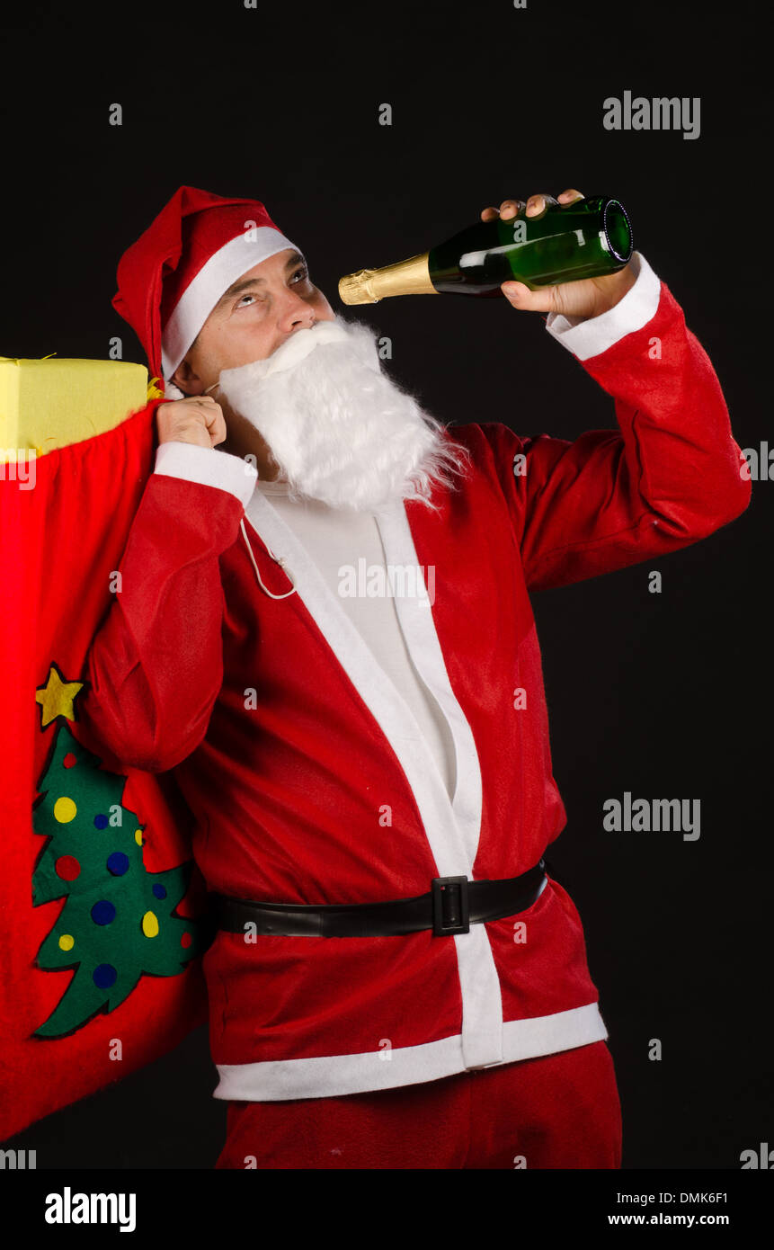 A frustrated Santa about to become an alcoholic Stock Photo - Alamy