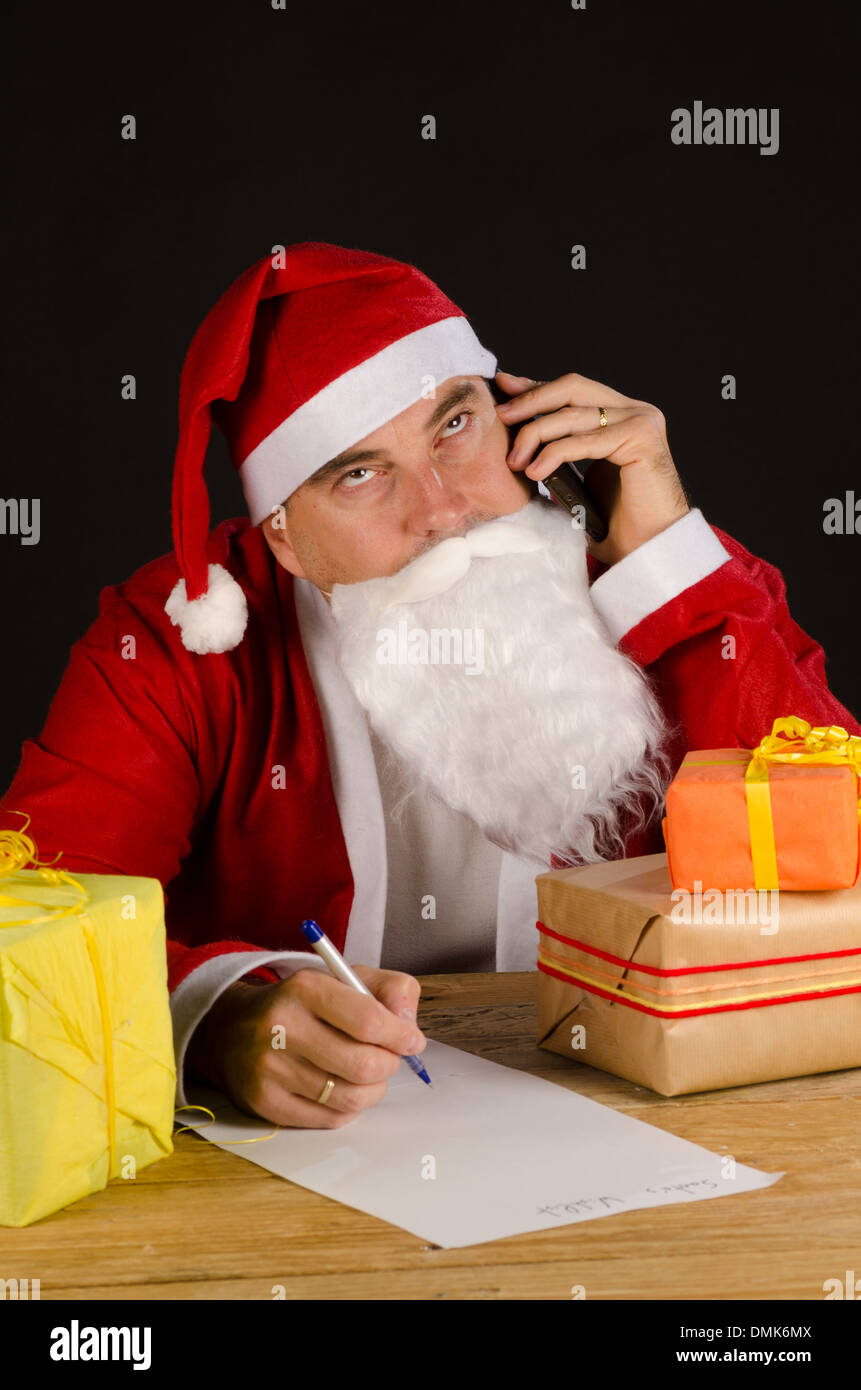 Santa frustrated gifts mobile hi-res stock photography and images - Alamy