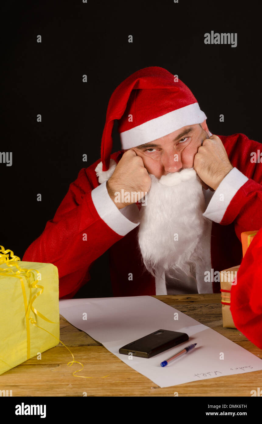 Exhausted Santa Claus Stock Photos & Exhausted Santa Claus Stock Images ...