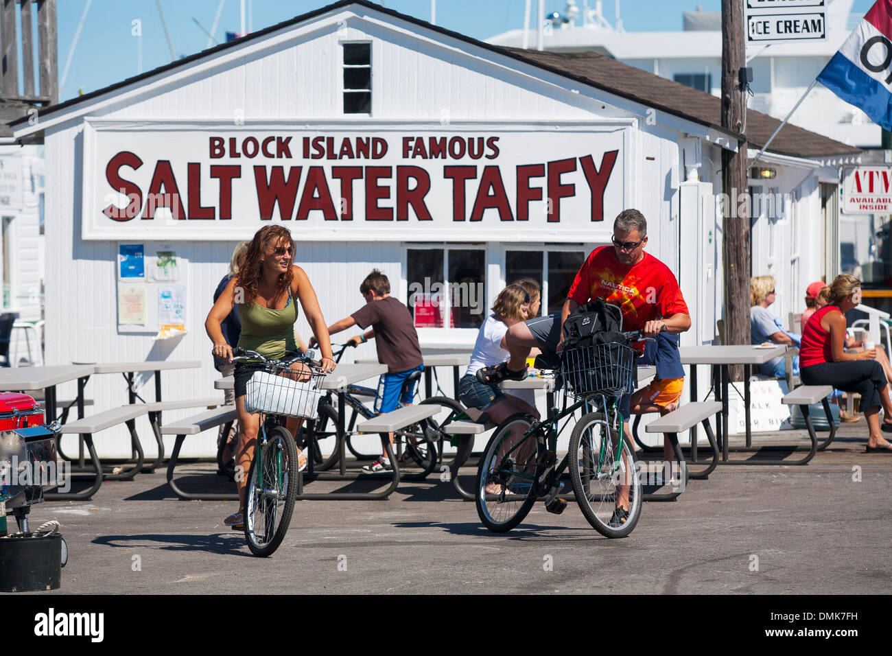 A sign advertising salt water taffy candies on the dock in Block Island ...
