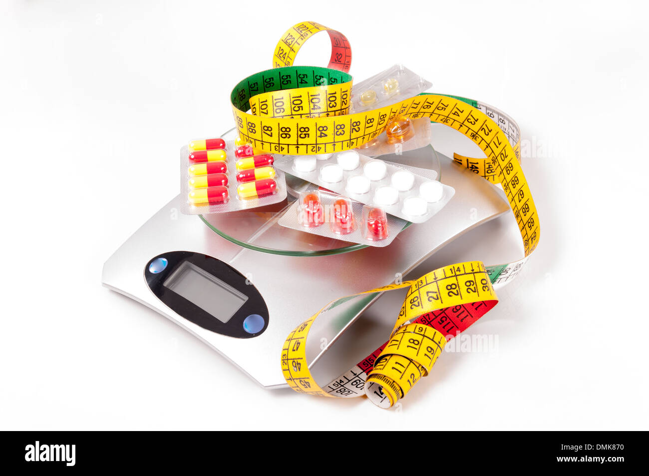 Measure and pills Cut Out Stock Images & Pictures - Alamy