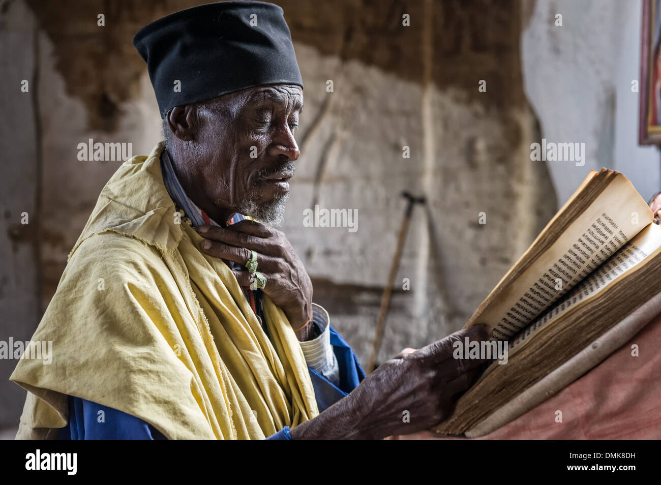 Old monk reading the Bible during the celebration of Orthodox Easter ...