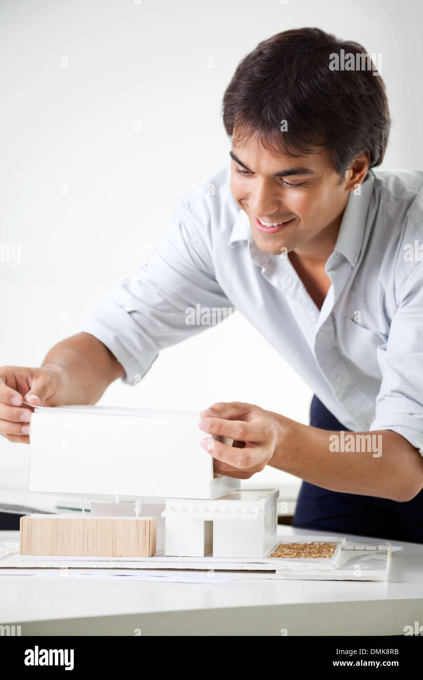 Architect Creating a Model House Stock Photo - Alamy