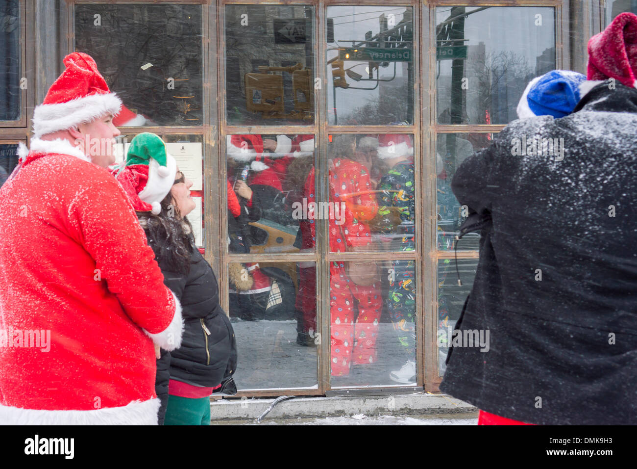 Christmas revelers at the Grey Lady bar in the Lower East Side ...
