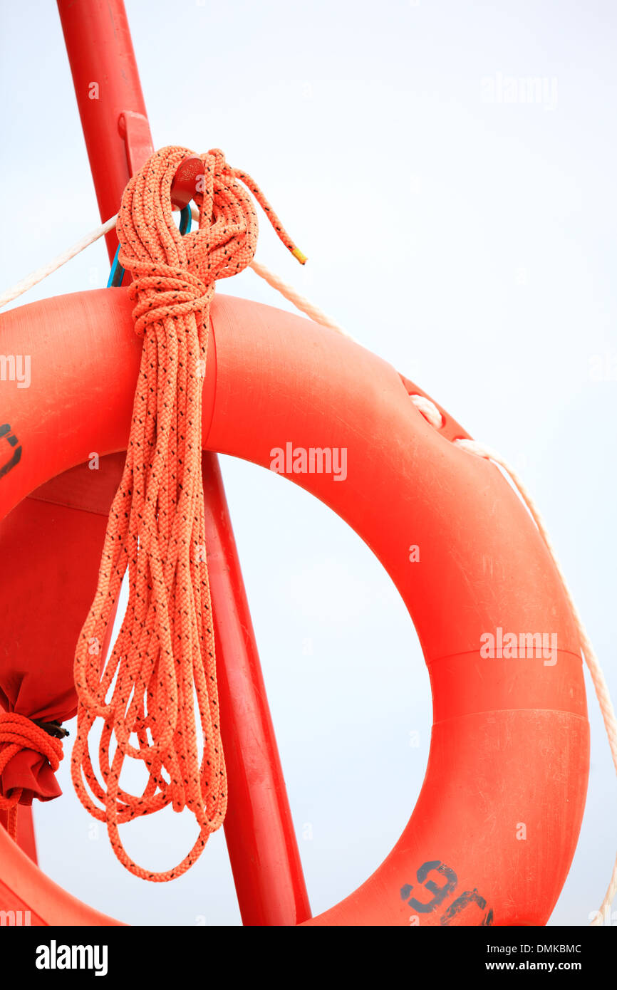 Beach life-saving. Lifeguard rescue equipment orange lifebuoy buoyancy ...