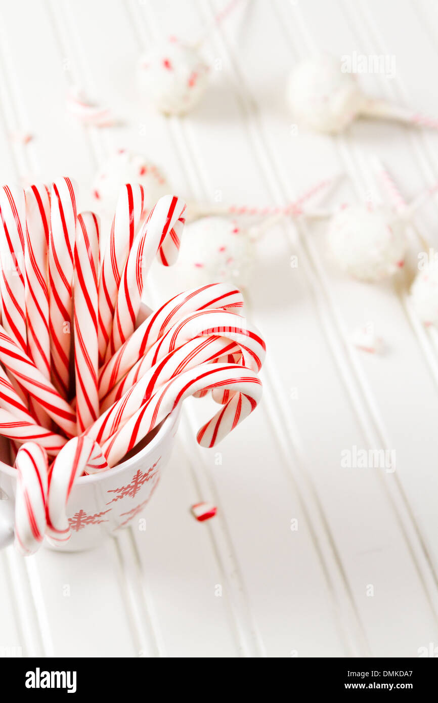 Peppermint chocolate cake pops dipped in white chocolate and candy cane ...