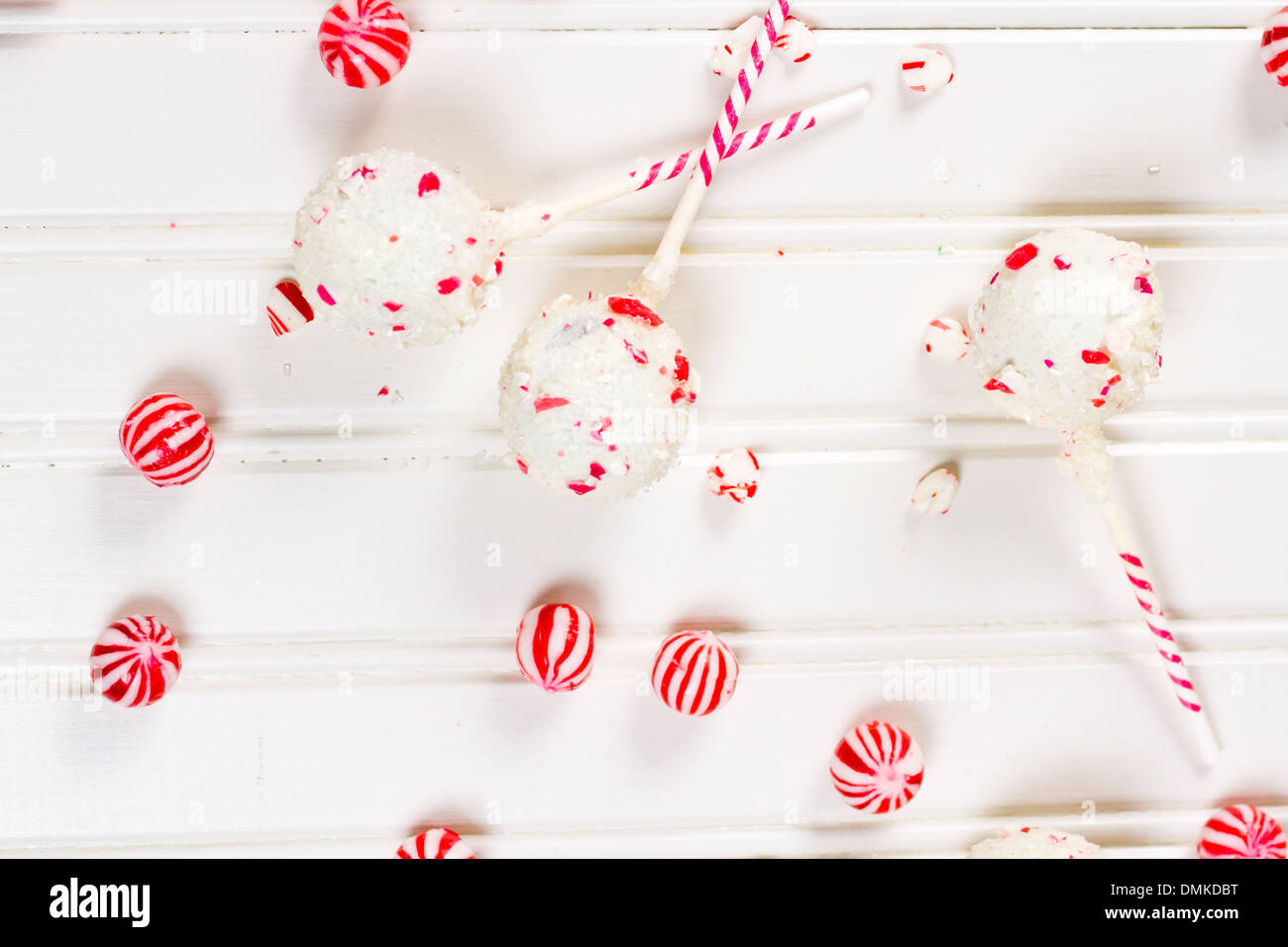 Peppermint chocolate cake pops dipped in white chocolate and candy cane ...