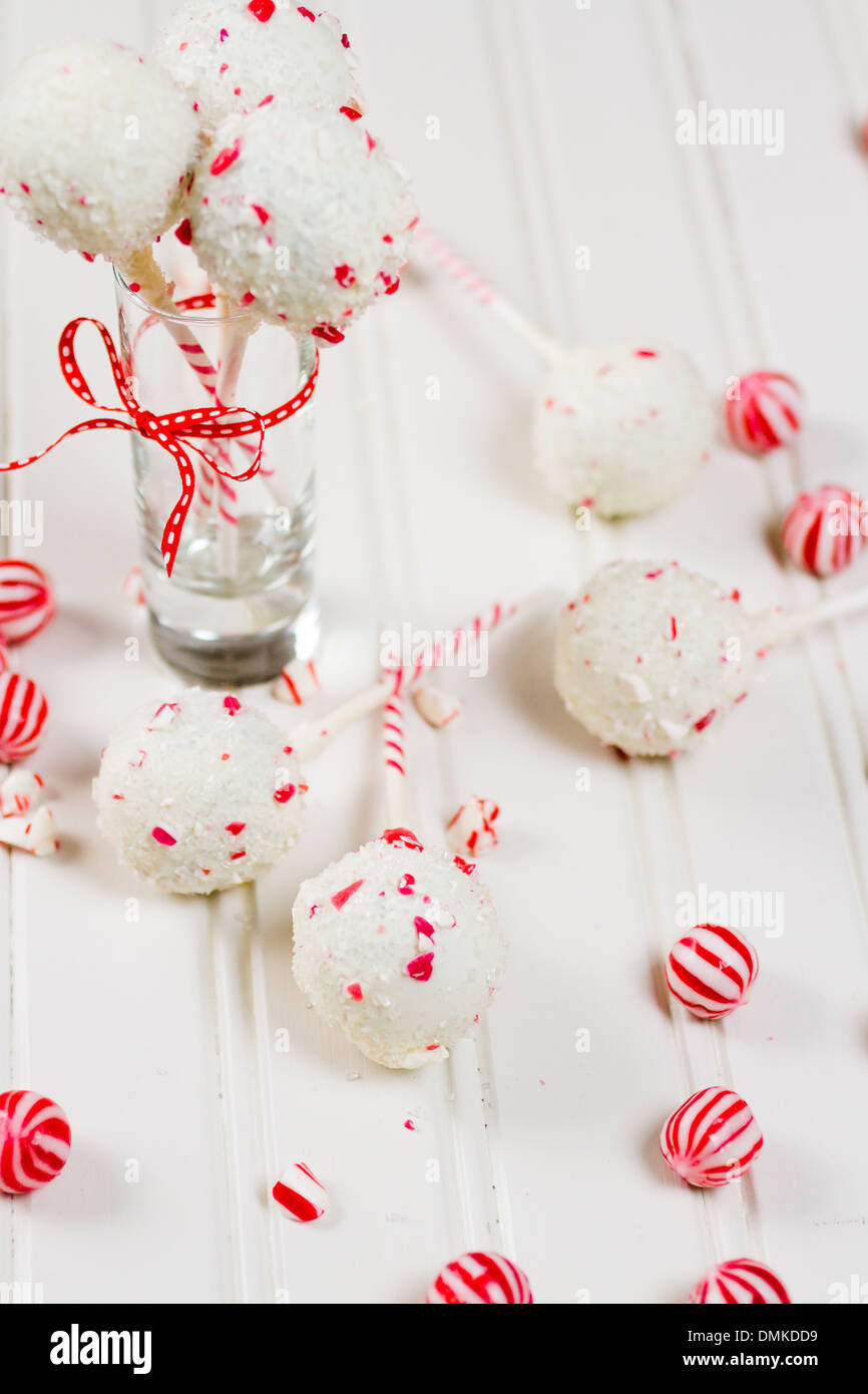 Peppermint chocolate cake pops dipped in white chocolate and candy cane ...