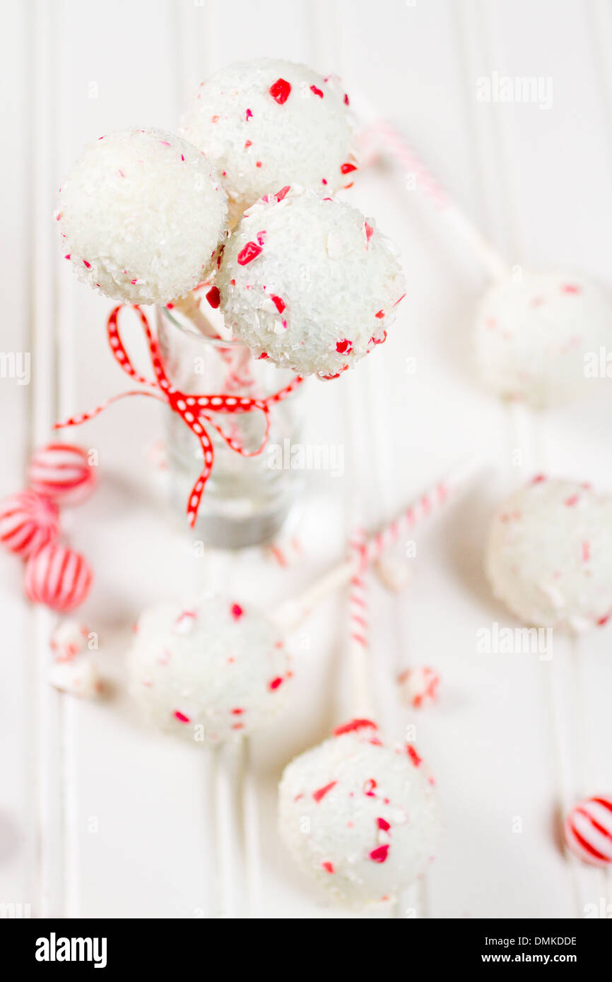 Peppermint chocolate cake pops dipped in white chocolate and candy cane ...