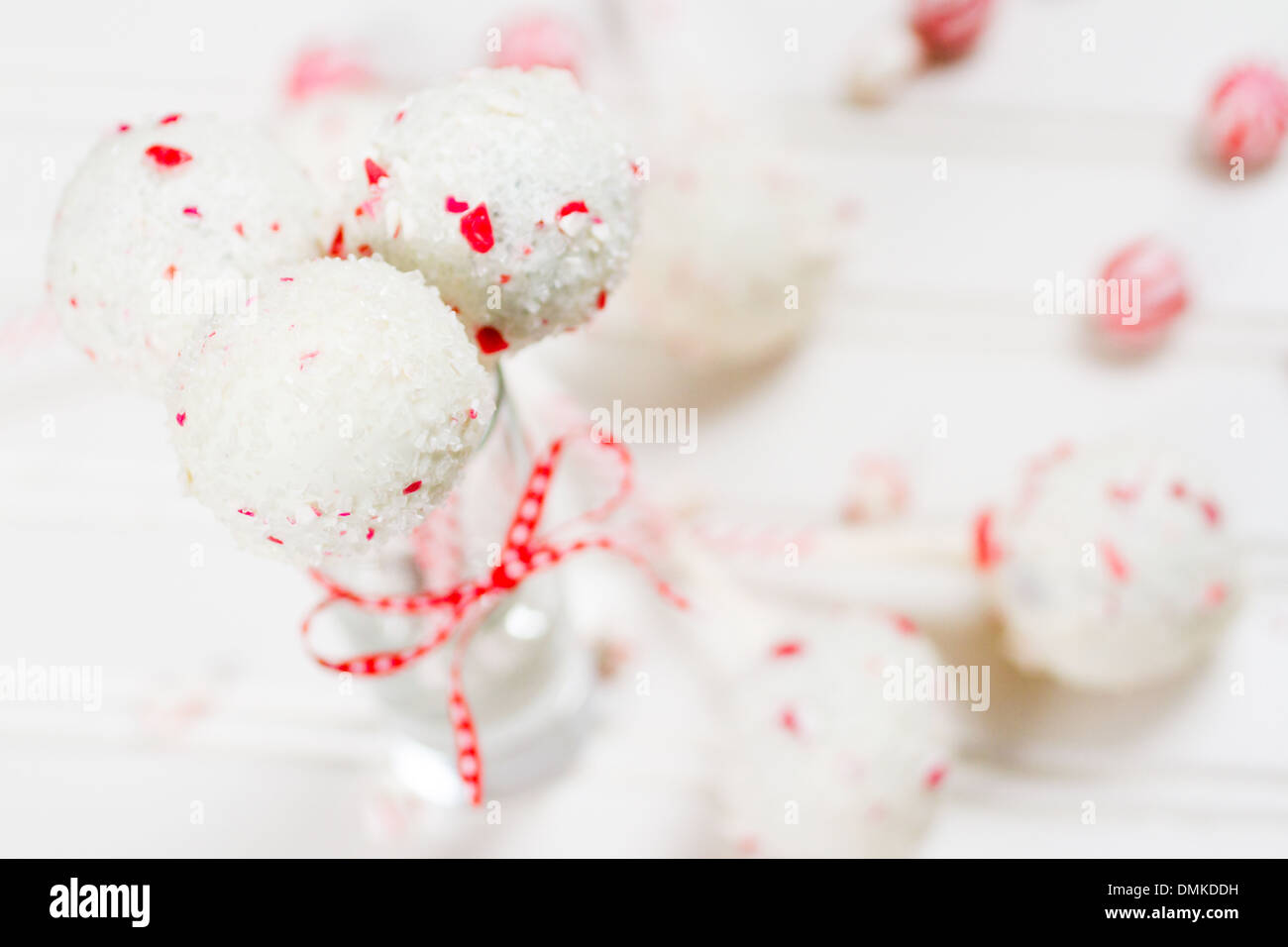 Peppermint chocolate cake pops dipped in white chocolate and candy cane ...