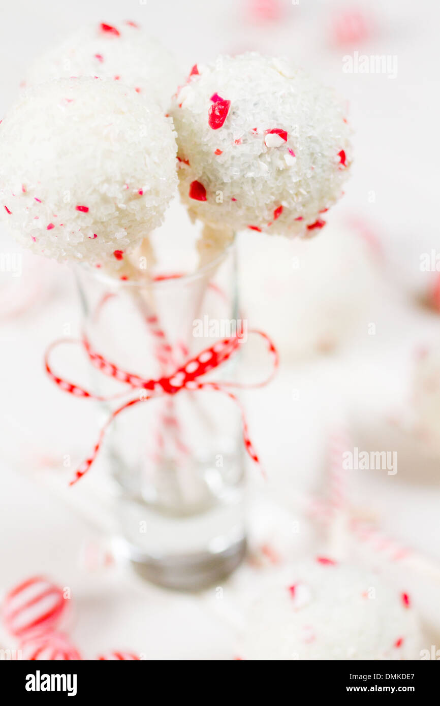 Peppermint chocolate cake pops dipped in white chocolate and candy cane ...