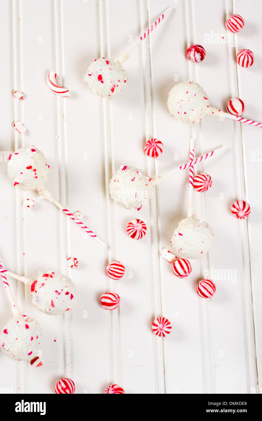 Peppermint chocolate cake pops dipped in white chocolate and candy cane ...
